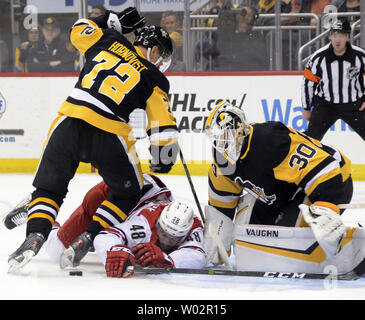 Carolina Hurricanes' Jordan Martinook (48) tangles with Utah Hockey ...
