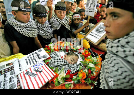 Palestinian children view Khaled Wahba, killed during an Israeli ...
