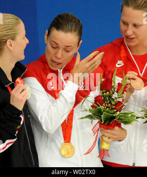 Gold medal winner Margaret Hoelzer of the U.S., center, silver medal ...