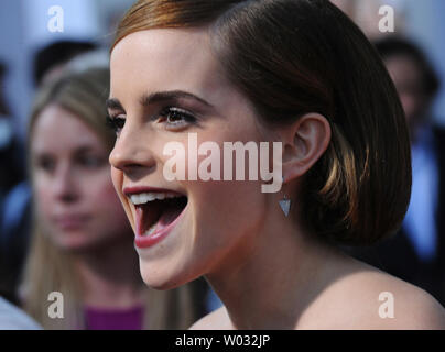 English actress Emma Watson, a cast member in the motion picture comedy ...