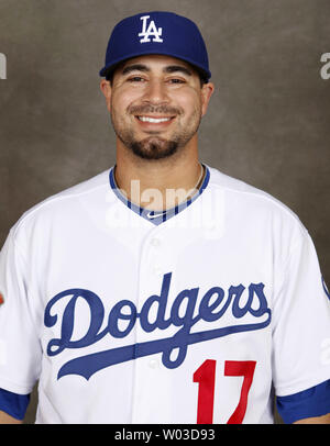 Los Angeles Dodgers' Jason Repko is hit in the elbow by a pitch by ...