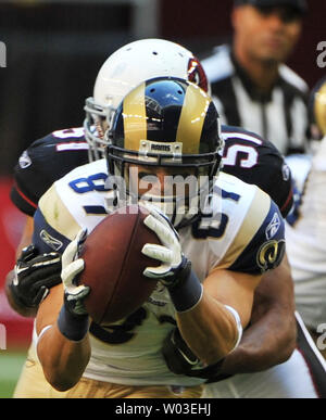 St. Louis Rams' Greg Salas (87) claps for his teammates as he is carted ...