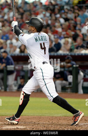 Arizona Diamondbacks' Ketel Marte watches his solo home run during the ...