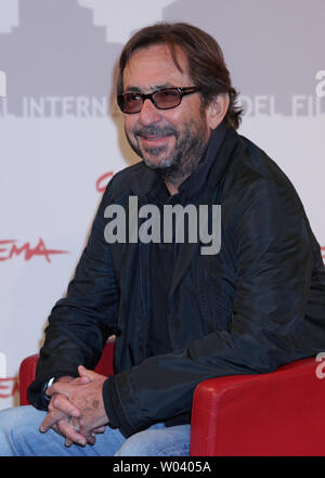 Sam Garbarski arrives at a photocall for the film "Quartier Lointain ...