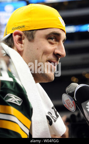 Green Bay Packers' Aaron Rodgers reacts at the NFL football team's ...