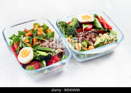 Healthy balanced lunch box with chicken, rice, vegetables. Office food ...
