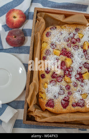 Peach galette, pie, cake with honey and berry on a wooden background ...