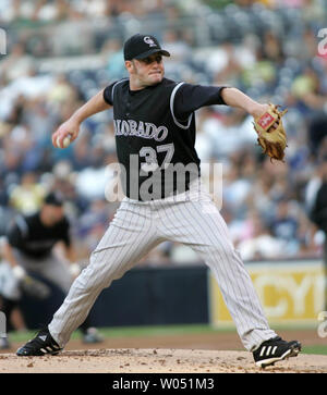 Colorado Rockies pitcher Josh Fogg pitches to the San Francisco Giants ...