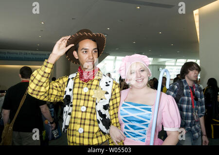 Comic-Con attendees pose during the 41th annual Comic-Con International ...