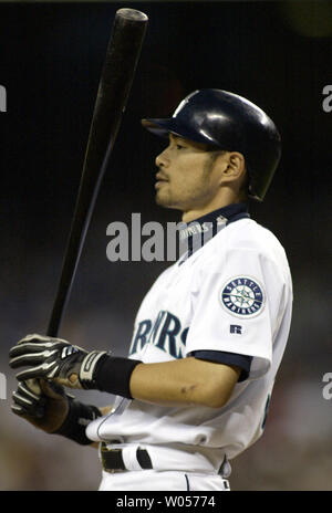 Seattle Mariners third base coach Manny Acta is seen in the dugout ...