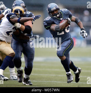 Seattle Seahawks running back Maurice Morris, right, stiff arms a ...