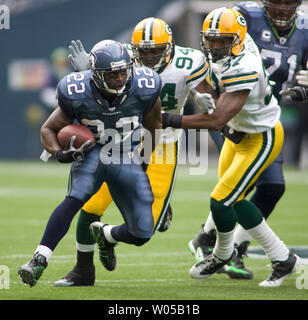 Green Bay Packers Aaron Rouse #37 after a 99-yard INT return for a TD ...