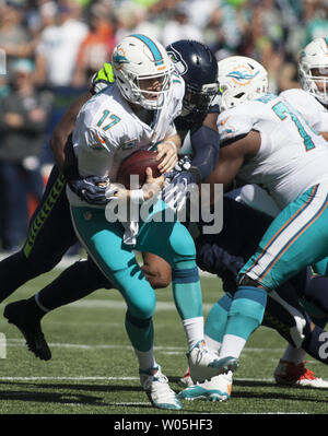 Seattle Seahawks defensive end Frank Clark (55) and linebacker Eric ...