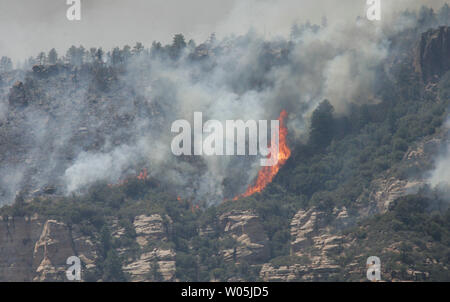 The Creek Fire burns on a ridge top along Highway 168 Tuesday, Sept. 8 ...