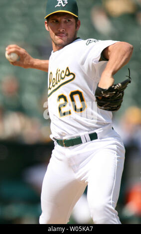 Oakland Athletics pitcher Huston Street looks away as Matt Stairs of ...