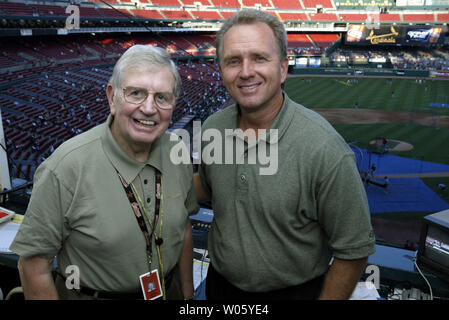 The St. Louis Cardinals radio broadcast team of John Rooney (L) and ...