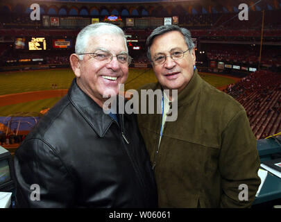 The St. Louis Cardinals radio broadcast team of John Rooney (L) and ...