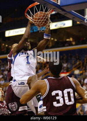 Southwest Missouri States' Kellen Easley (30) looks for daylight as ...