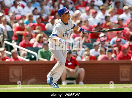 Chicago Cubs' Aramis Ramirez watches the flight of his RBI sacrifice ...