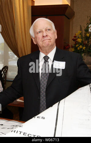 Hotel founder and owner Charles Drury (C) stands with his family ...
