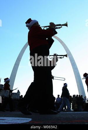 Members of the Bayless High School Marching Band make their way up ...