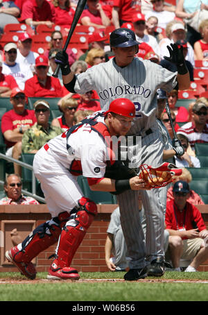 St. Louis Cardinals catcher Steve Lake hangs tough against an inbound ...
