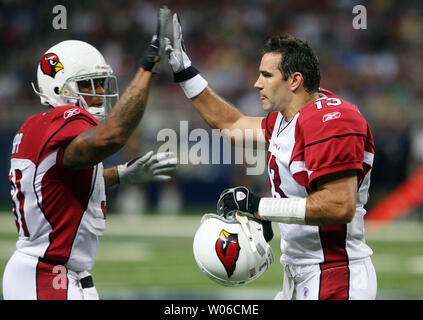 The Arizona Cardinals' Marcel Shipp (31) scores despite the defensive ...