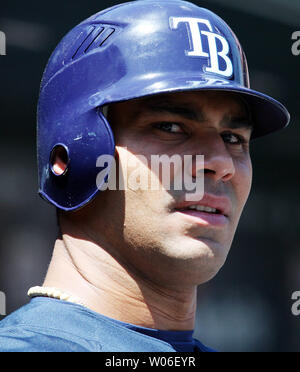 Tampa Bay Rays' Carlos Pena rounds third on his way home to score the ...