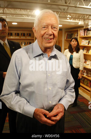 Jimmy Carter Book Signing for We Can Have Peace in the Holy Land Stock ...