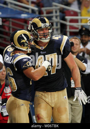 Baltimore Ravens tight end Billy Bajema, right, catches a 7-yard ...