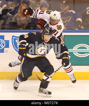Chicago Blackhawks' Marian Hossa (81) and New York Islanders' Frans ...