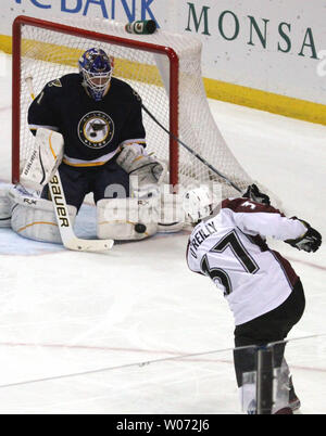 St. Louis Blues goalie Ryan Miller waves to fans as he leaves the ice ...