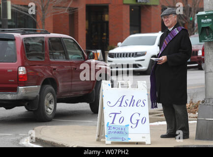 The Rev. Kevin McGrane looks for interested people to partake in a Ash ...
