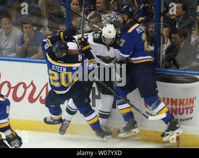 Minnesota Wild center Eric Staal controls the puck against the Calgary ...