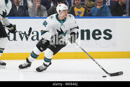 San Jose Sharks' Kevin Labanc (62) vies for control of the puck with ...