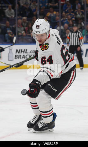 Chicago Blackhawks center David Kampf (64) plays against the Nashville ...