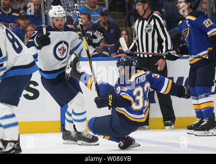 St. Louis Blues' Jordan Kyrou (25) chases after a loose puck as Ottawa ...