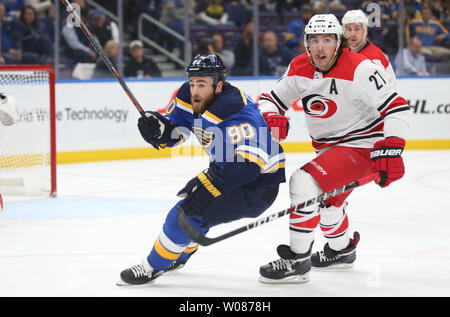 St. Louis Blues' Justin Faulk (72) checks Edmonton Oilers' Ty Emberson ...