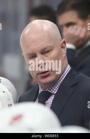 New Jersey Devils head coach John Hynes instructs Tyler Kennedy (48 ...