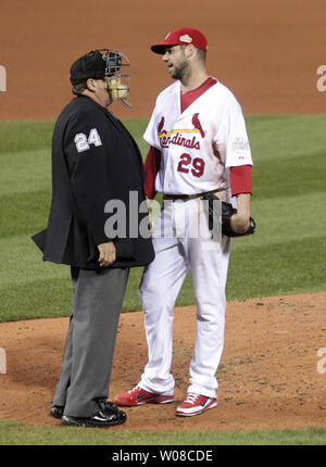 Home plate umpire Jerry Layne (24) calls a strike in the top of the ...