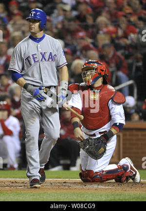 Texas Rangers' Michael Young strikes out in the second inning against ...