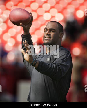 Philadelphia Eagles QB Donovan McNabb #5 is helped up by a referee ...