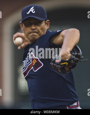 Atlanta Braves' Kenshin Kawakami, of Japan, adjusts his helmet as he ...