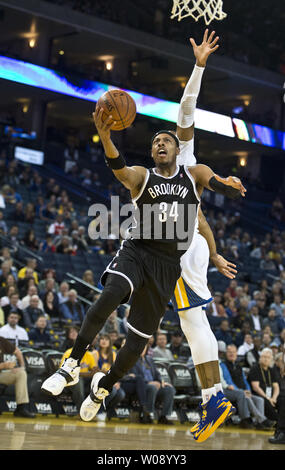 The Brooklyn Nets' Paul Pierce (34) looks to pass against Miami Heat's ...