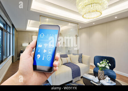 smart phone with smart home with modern living room Stock Photo - Alamy