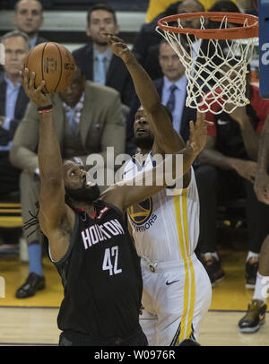 Houston Rockets forward Kevin Durant, center, recovers a loose ball for ...