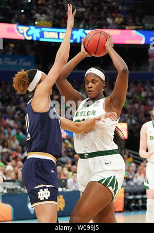 Baylor center Kalani Brown (21) grabs the loose ball from Langston's ...