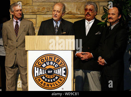 The Statler Brothers, Phil Balsley, Don Reid, Harold Reid, and Jimmy Fortune, from left, accept ...
