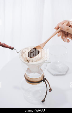 Man spills coffee powder to Drip Coffee Stock Photo - Alamy