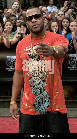 Rapper Flo Rida arrives on the red carpet on Queen Street West for the ...